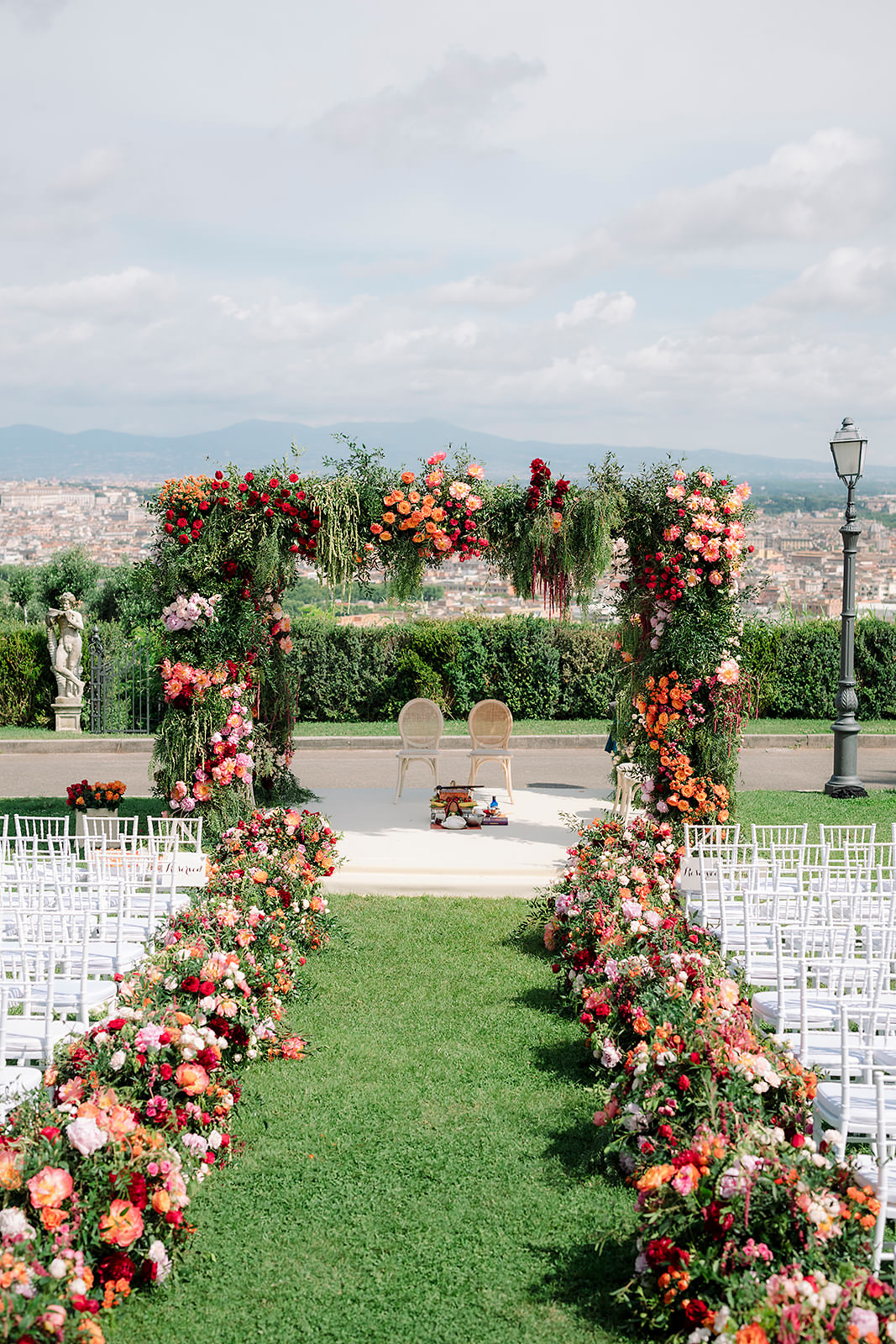 A beautiful outdoor wedding setup unfolds like a Roman fairytale, with ...