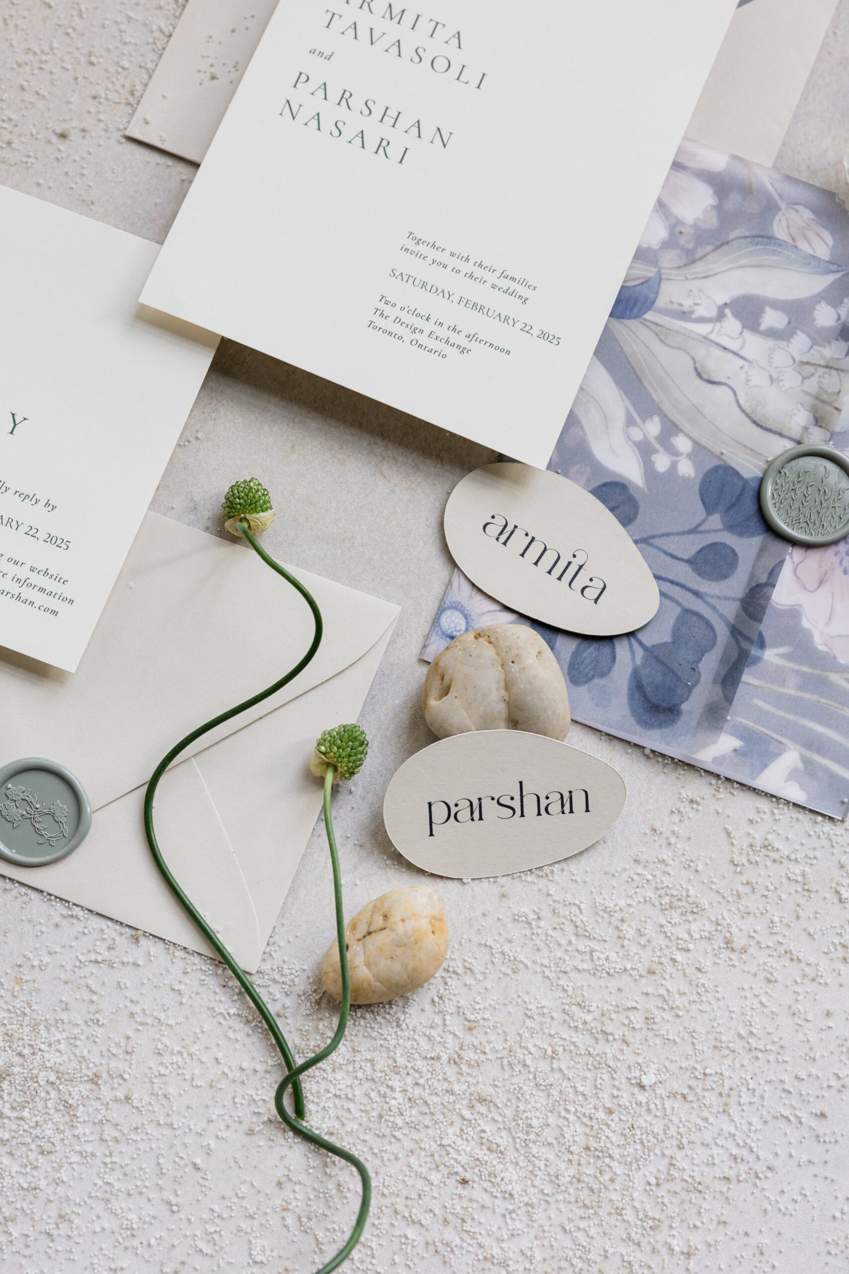 A flat lay of elegant wedding stationery, including invitations ...
