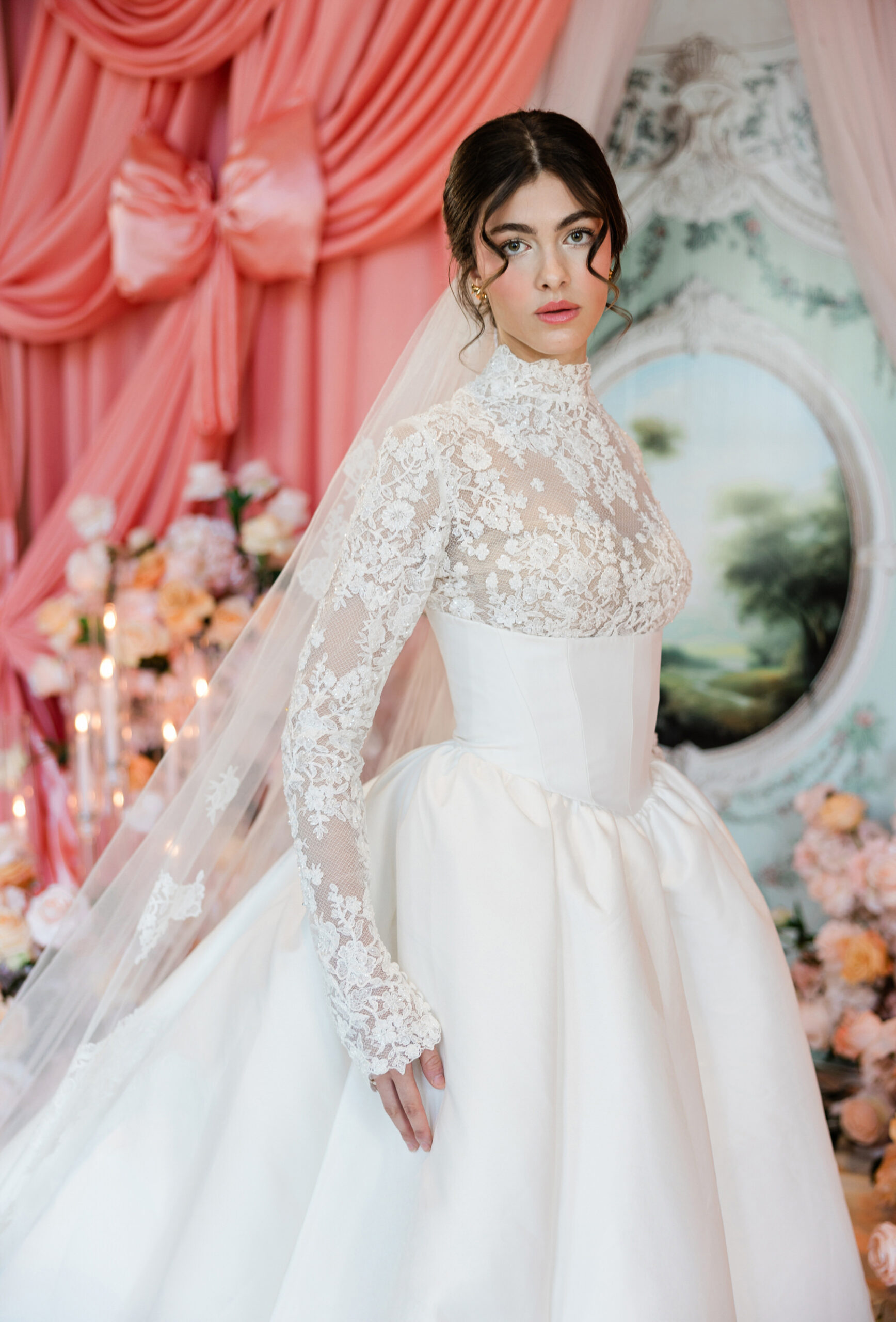 A bride in a white lace Rococo Revival bridal gown with long sleeves ...