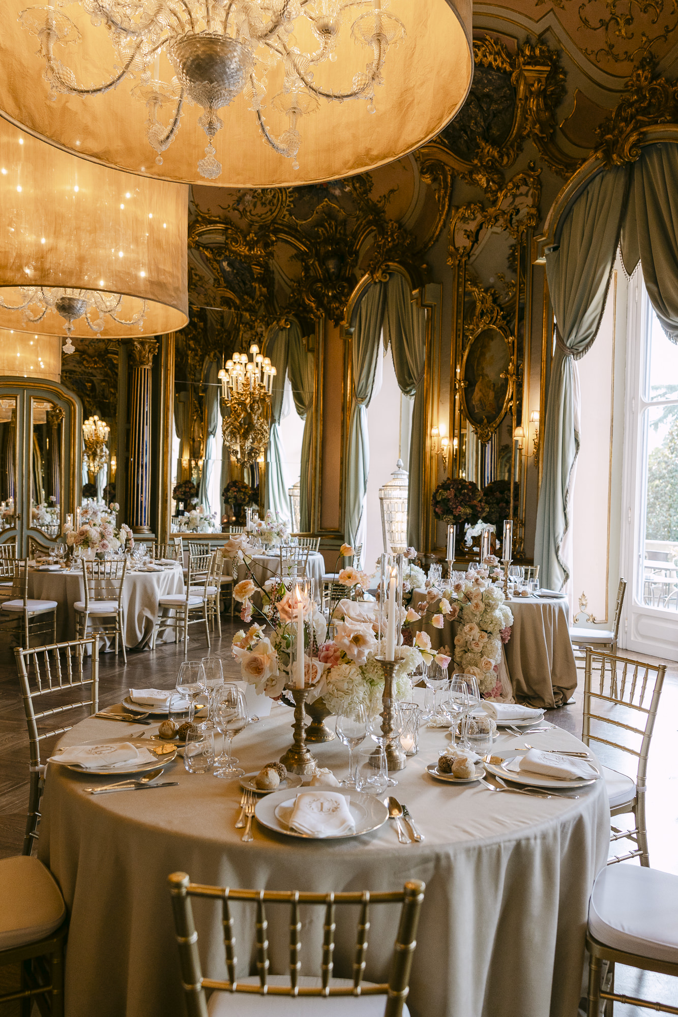 An elegant, ornately decorated ballroom at Villa Cora set for a luxury ...