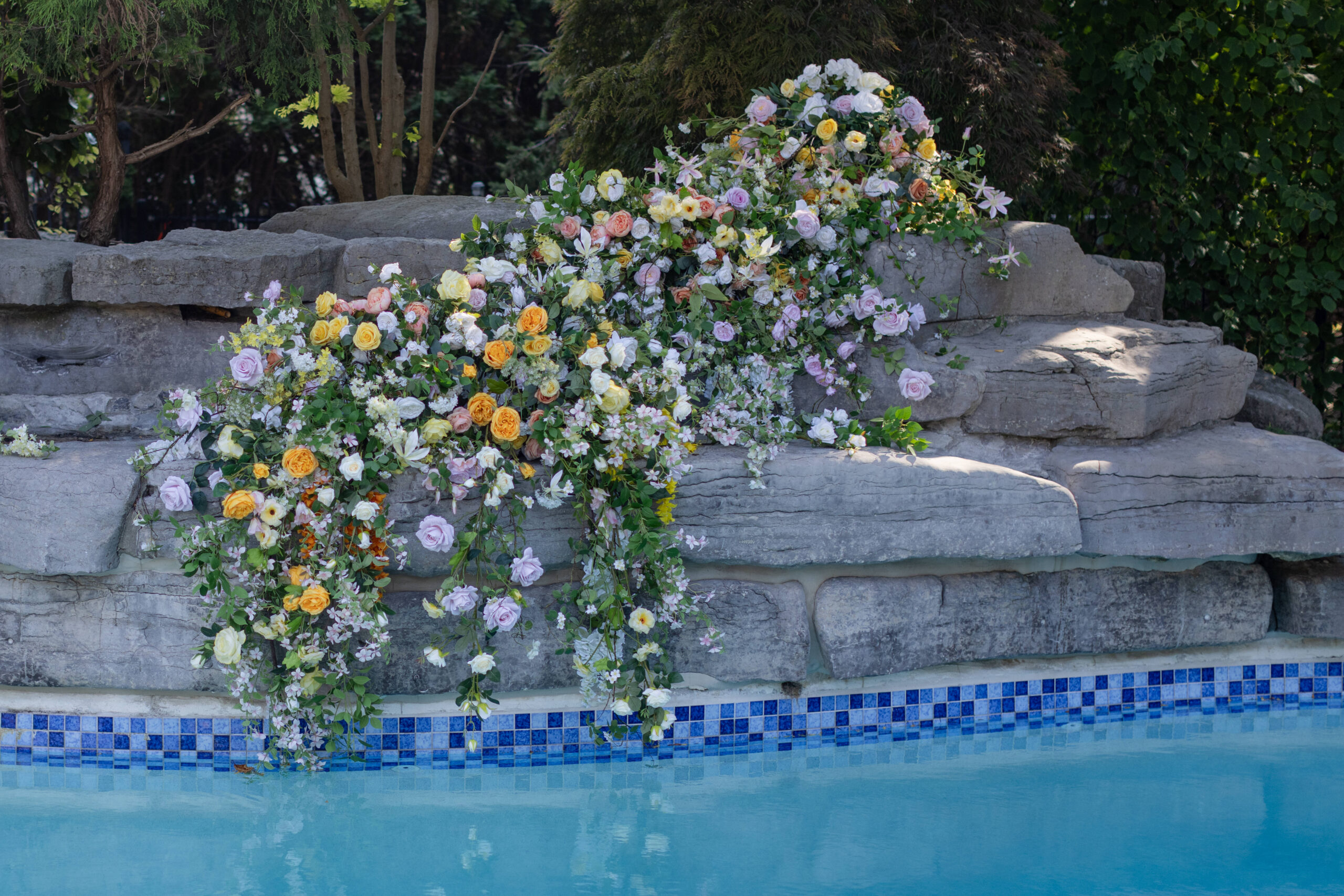 A lush, Italian-inspired engagement floral arrangement with yellow ...